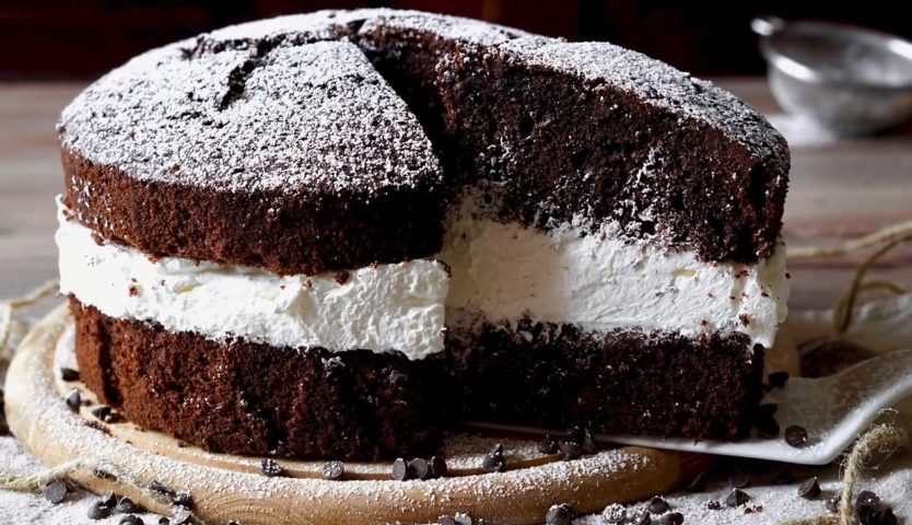 Fluffy chocolate cake with whipped cream: an explosion of taste