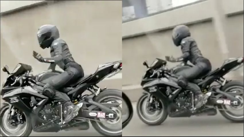 La ragazza sexy balla a bordo della sua super moto: Suzuki GSX-750 R